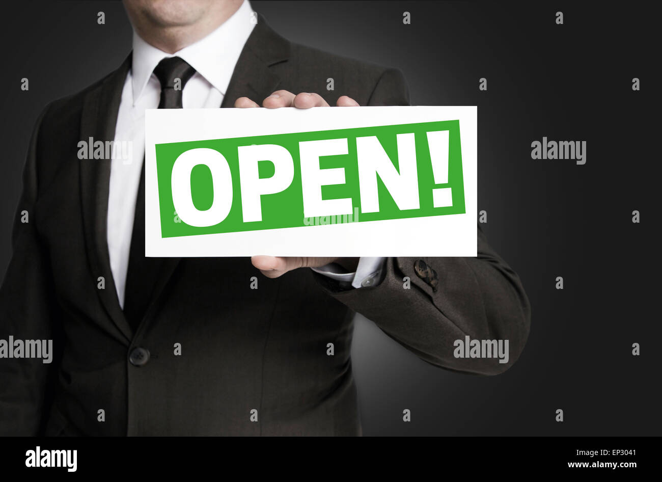 Open sign is held by businessman Stock Photo - Alamy