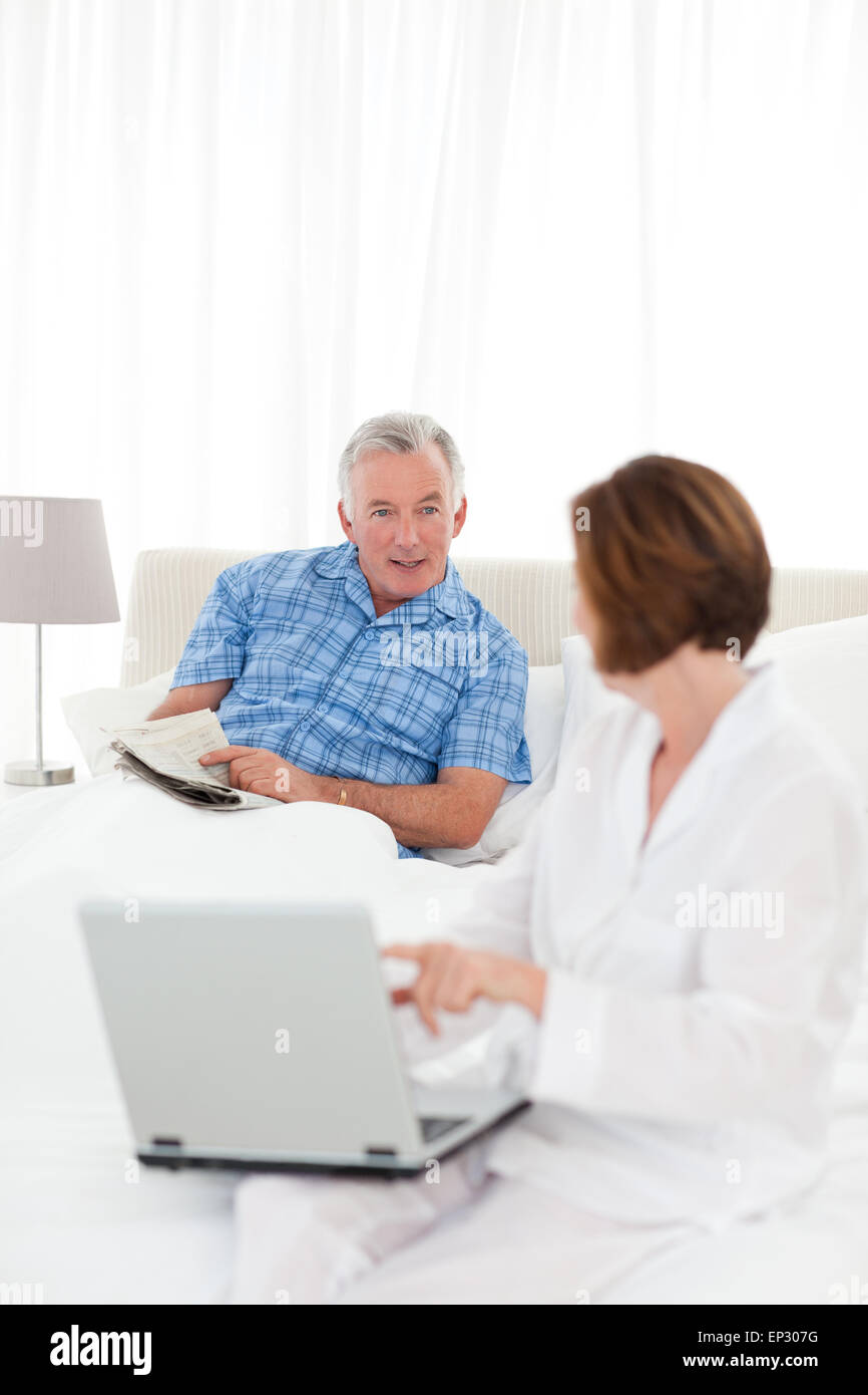Seniors talking in the bed Stock Photo - Alamy