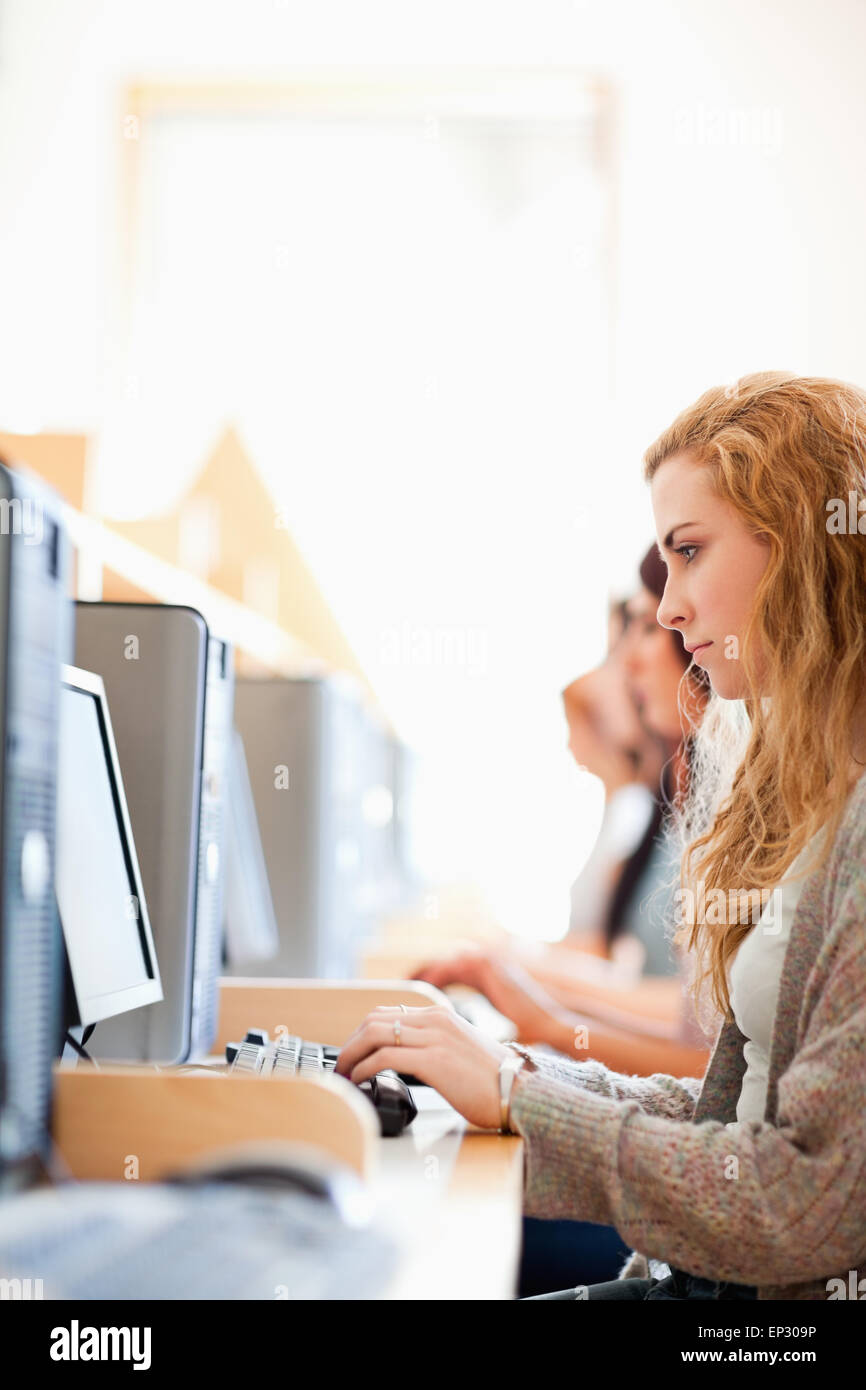 Portrait of a student working with a computer Stock Photo - Alamy