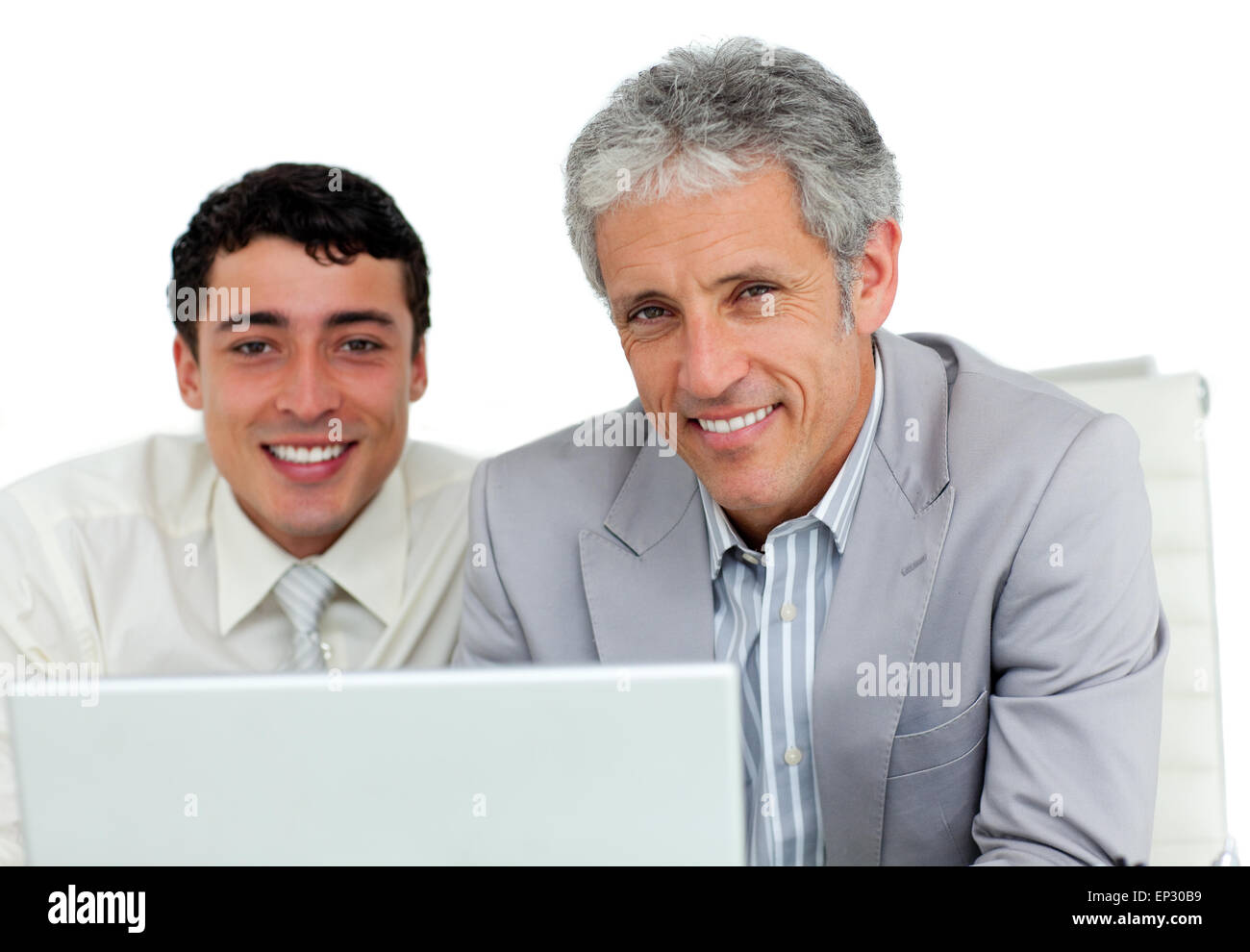 Serious businessmen working at a computer in an office Stock Photo - Alamy
