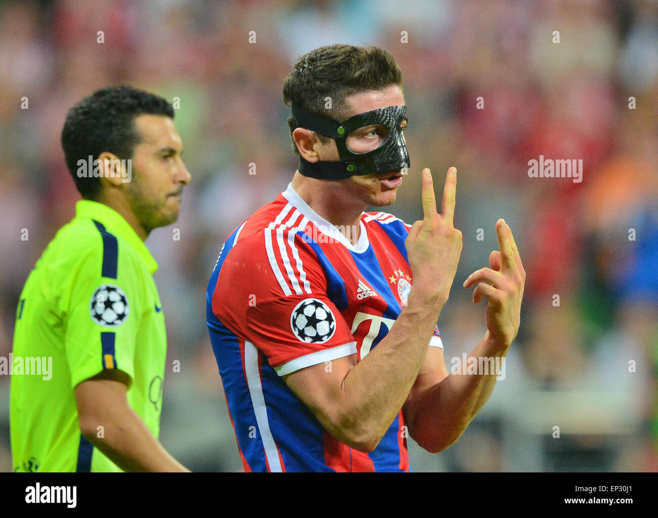 Munich, Germany. 12th May, 2015. Bayern Munich's Robert Lewandowski (R ...