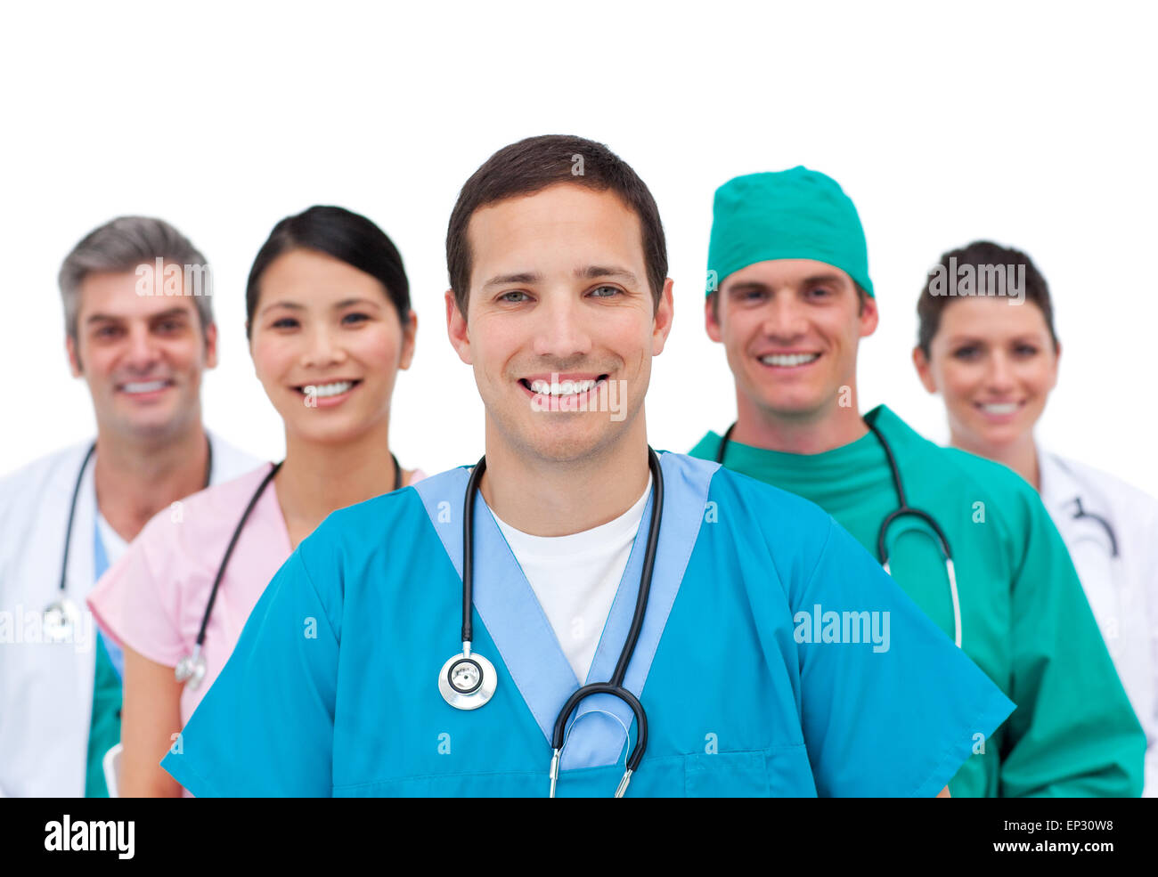 Smiling medical team against a white background Stock Photo - Alamy
