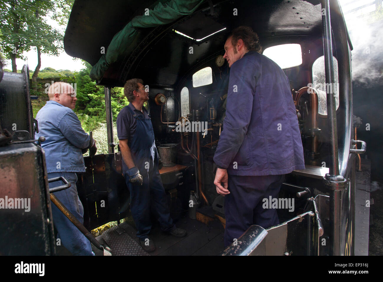 train driver on a steam locomotive at the Keighley and Worth Valley ...