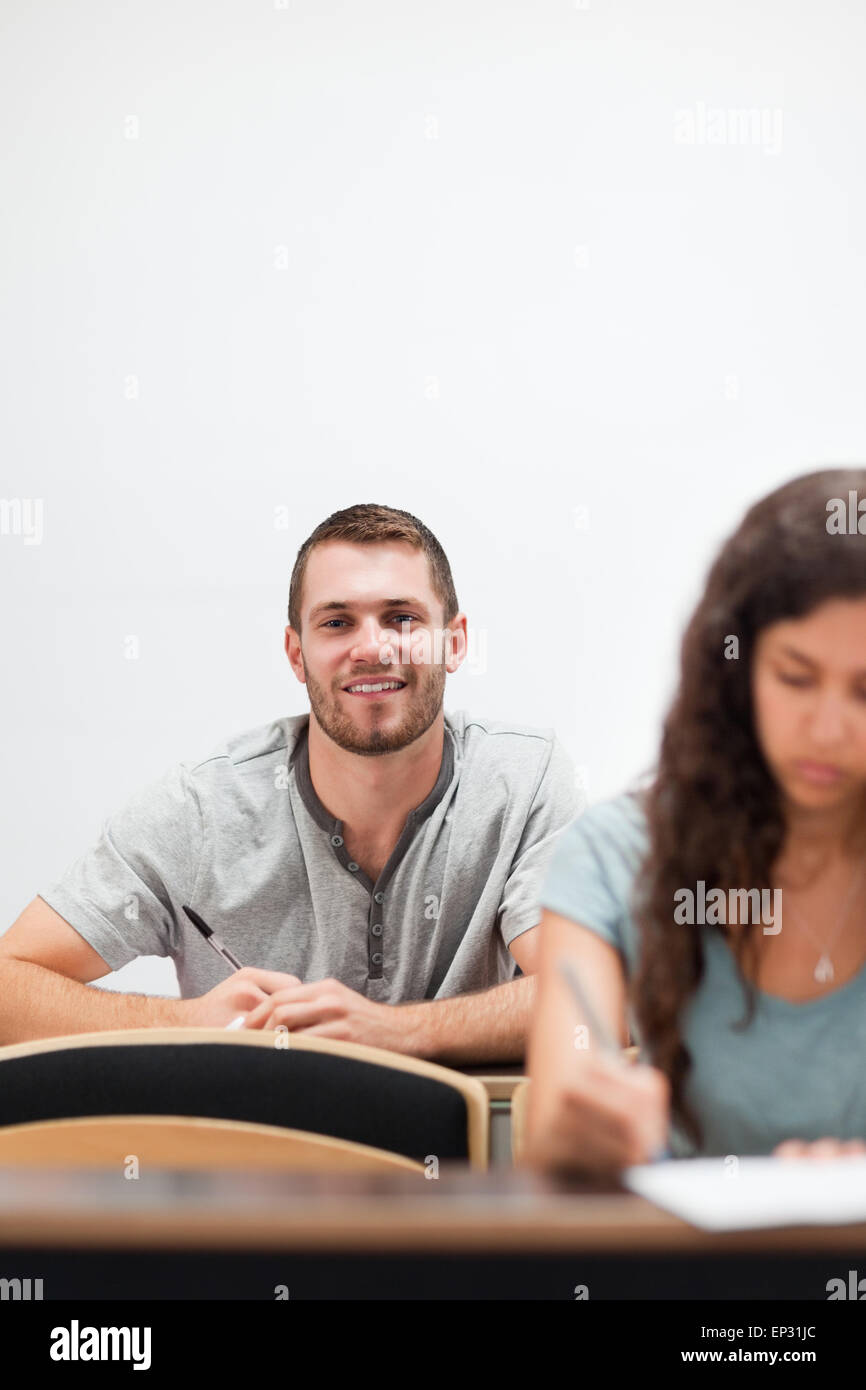 Portrait of a smiling handsome student Stock Photo - Alamy