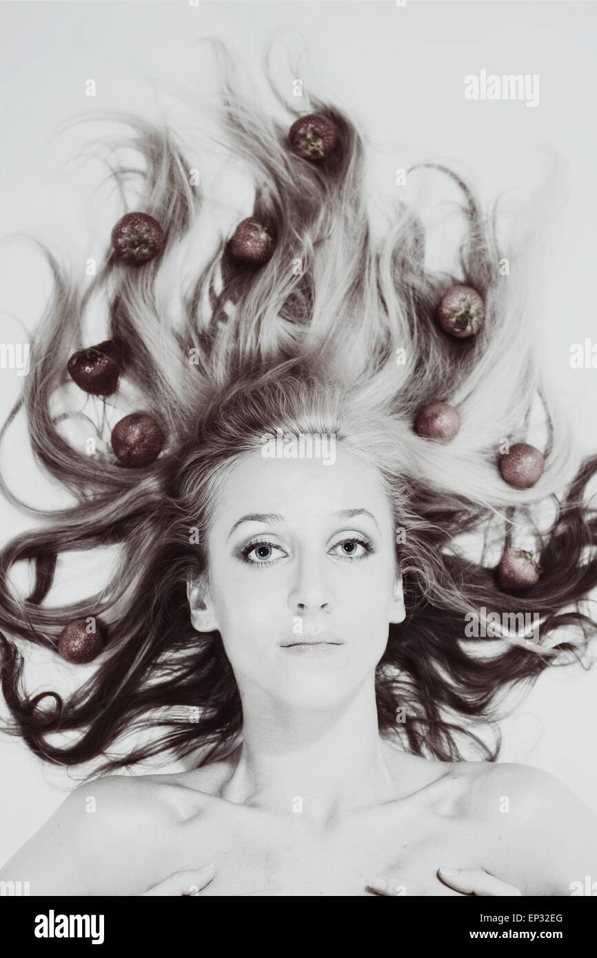 beautiful fair woman with silver makeup eating strawberries Stock Photo ...