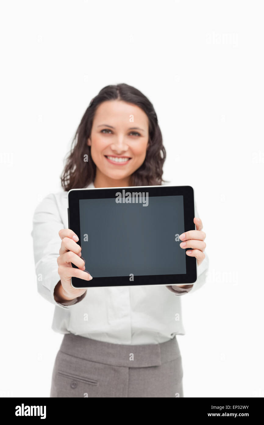 Portrait of a brunette showing a touchpad screen Stock Photo - Alamy