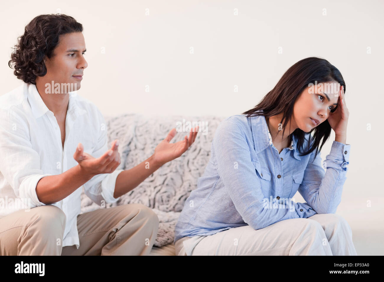 Male trying to apologize to his girlfriend Stock Photo - Alamy