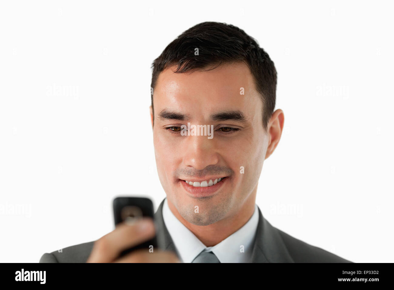 Close up of businessman reading a text message Stock Photo - Alamy