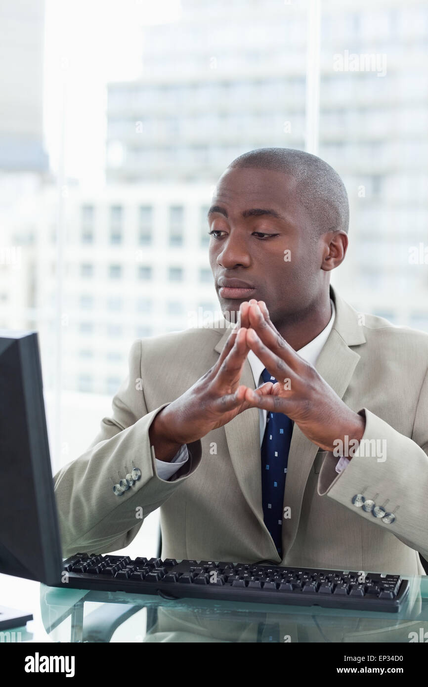 Portrait of a serious office worker using a computer Stock Photo - Alamy