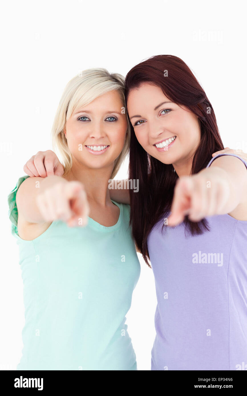 Cheering friends posing Stock Photo - Alamy