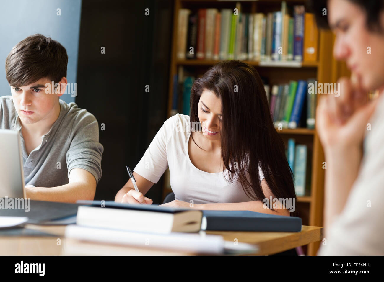 Students working on an essay Stock Photo - Alamy
