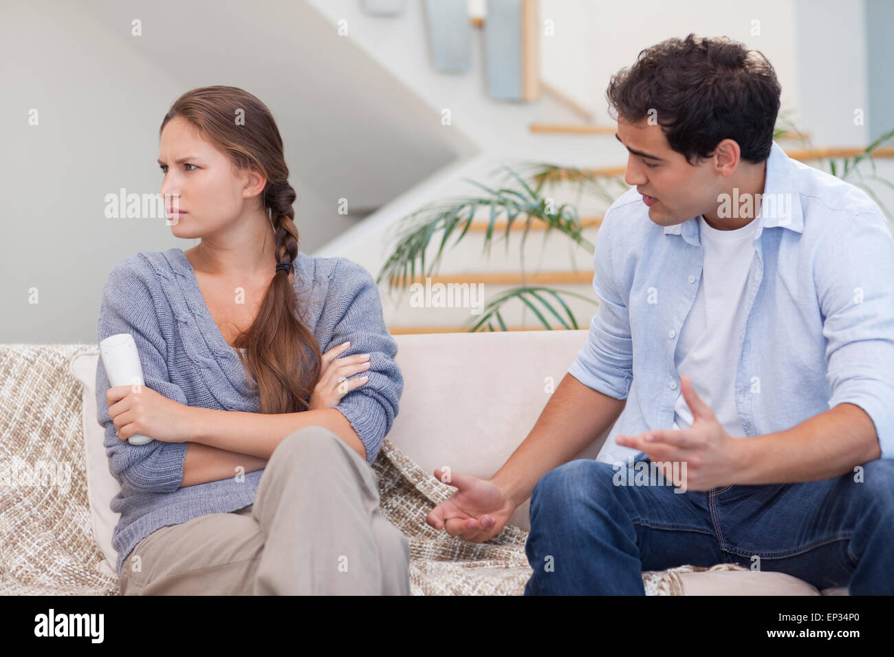 Man arguing with his wife Stock Photo - Alamy