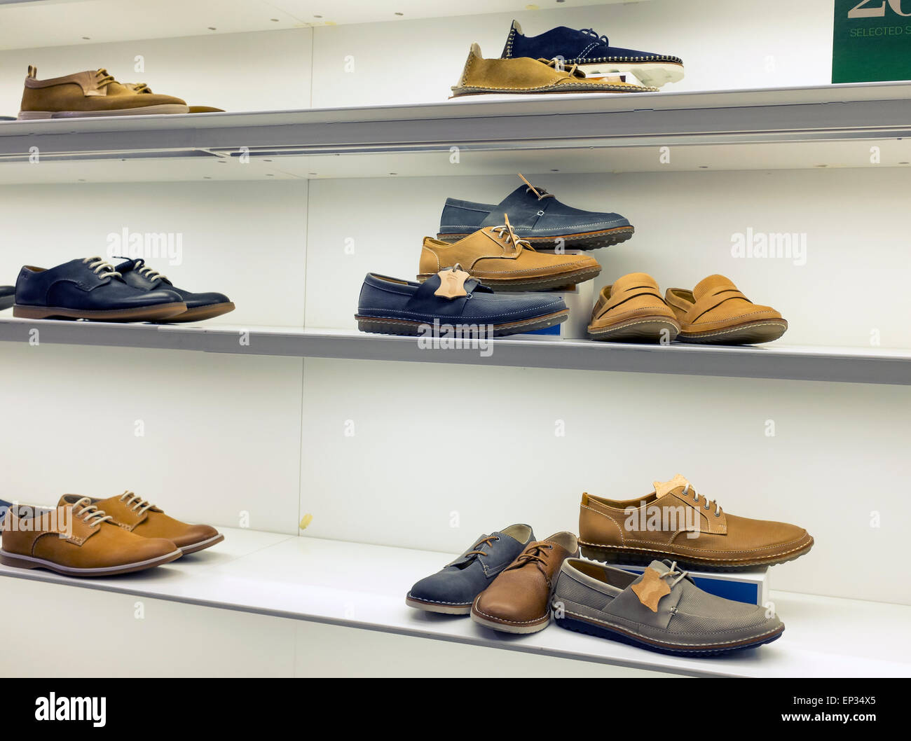 New shoes on display in shoe shop Stock Photo - Alamy
