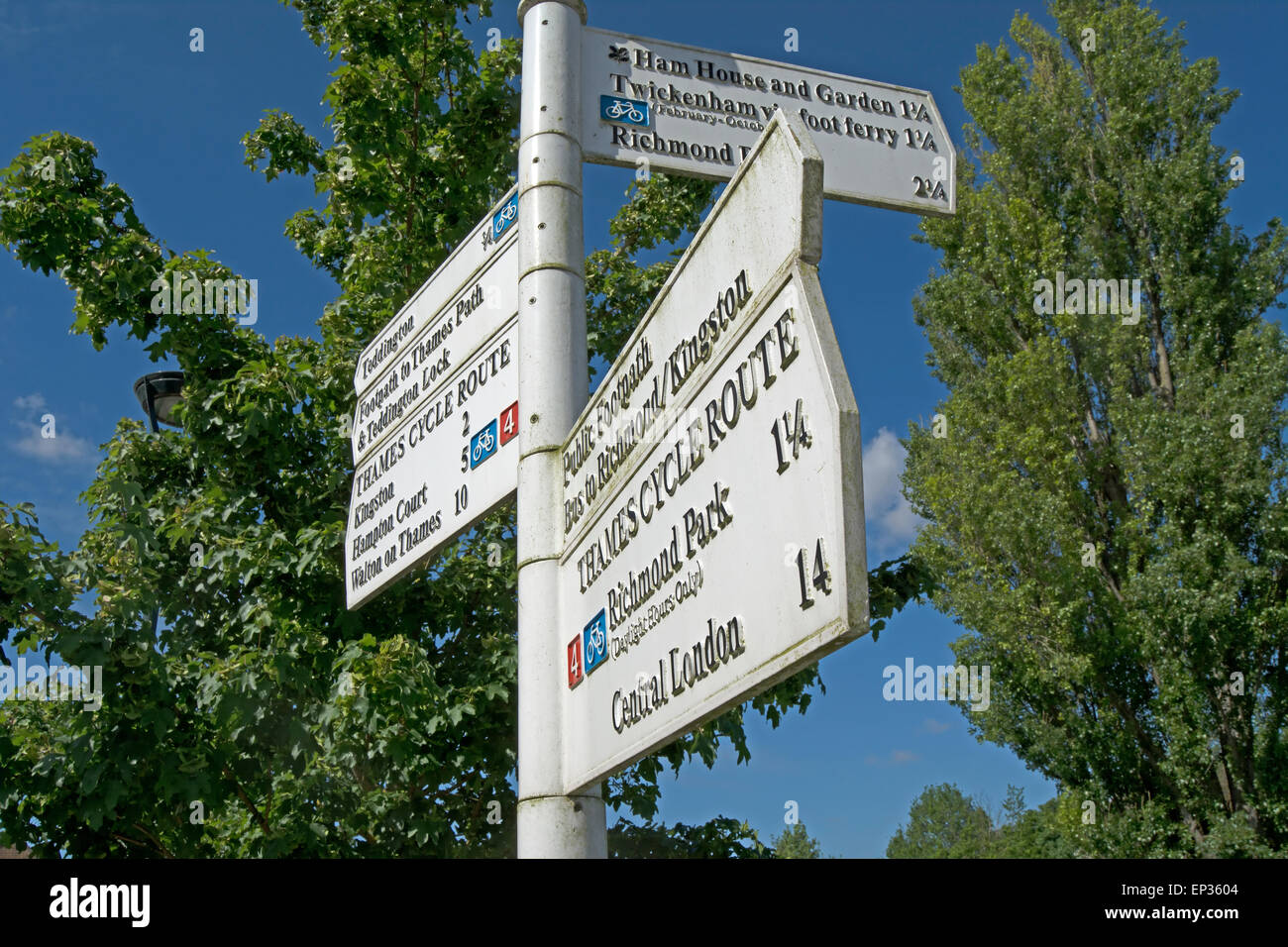 signpost showing thames cycle route and distance to richmond park and ...