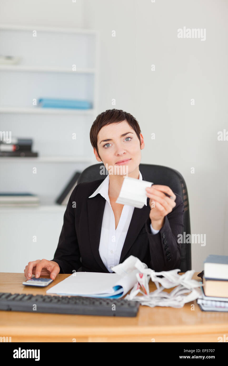 Portrait of an office worker doing accountancy Stock Photo - Alamy