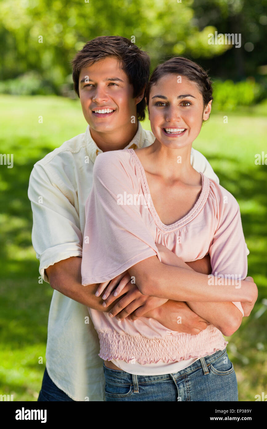 Man looking into the distance while he is holding his friend Stock ...