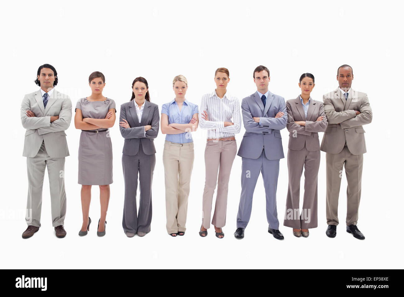 Serious business team side by side crossing their arms Stock Photo - Alamy