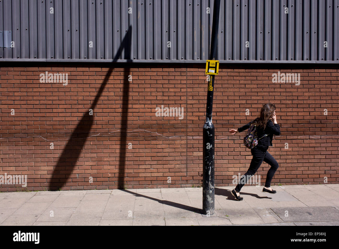 Leaning On Lamppost Stock Photos & Leaning On Lamppost Stock Images - Alamy