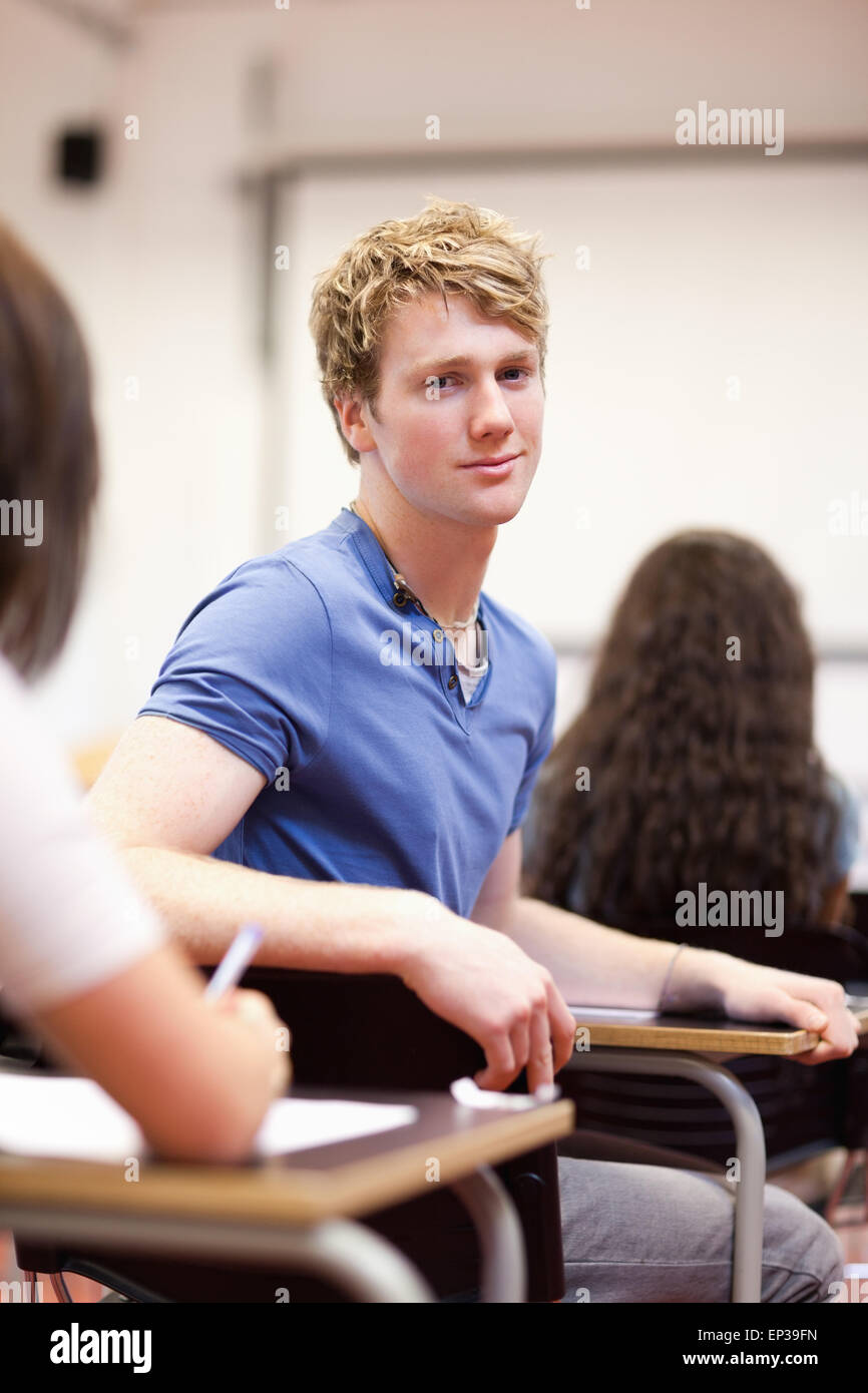Portrait of a student sitting Stock Photo - Alamy