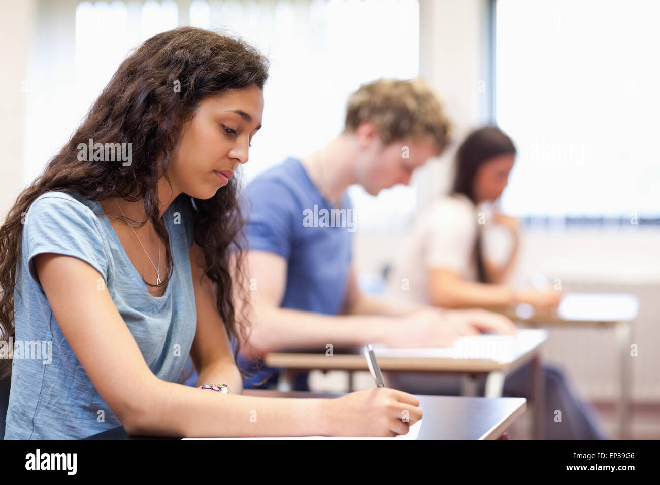 Studious young men hi-res stock photography and images - Alamy