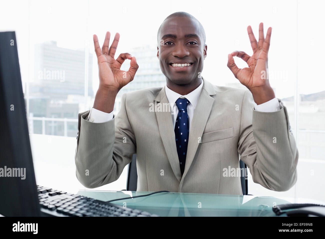 Entrepreneur signing that everything is perfect Stock Photo - Alamy
