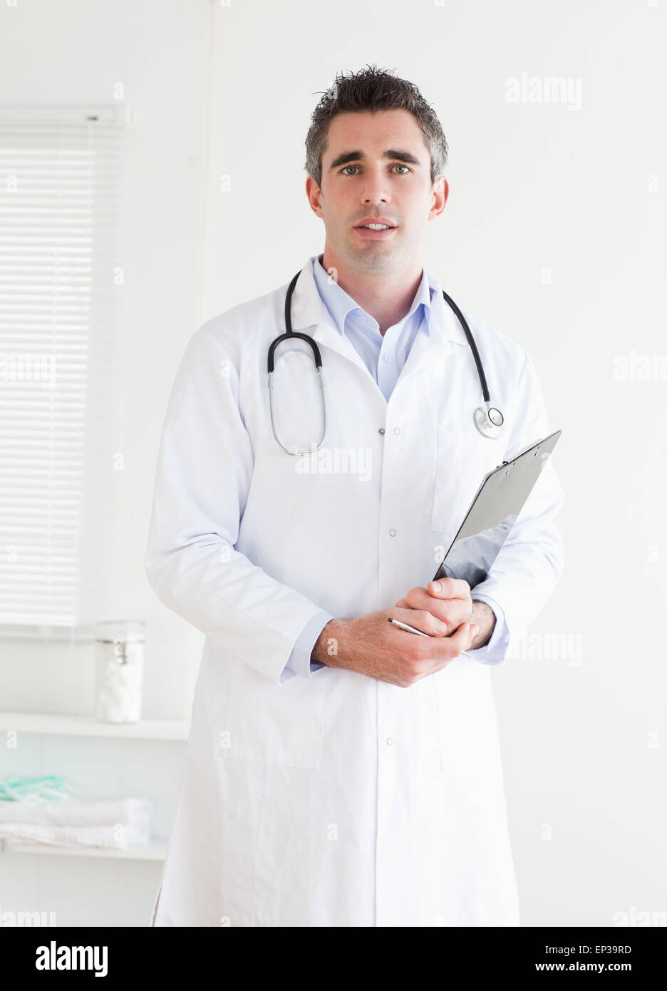 Doctor looking into the camera Stock Photo - Alamy