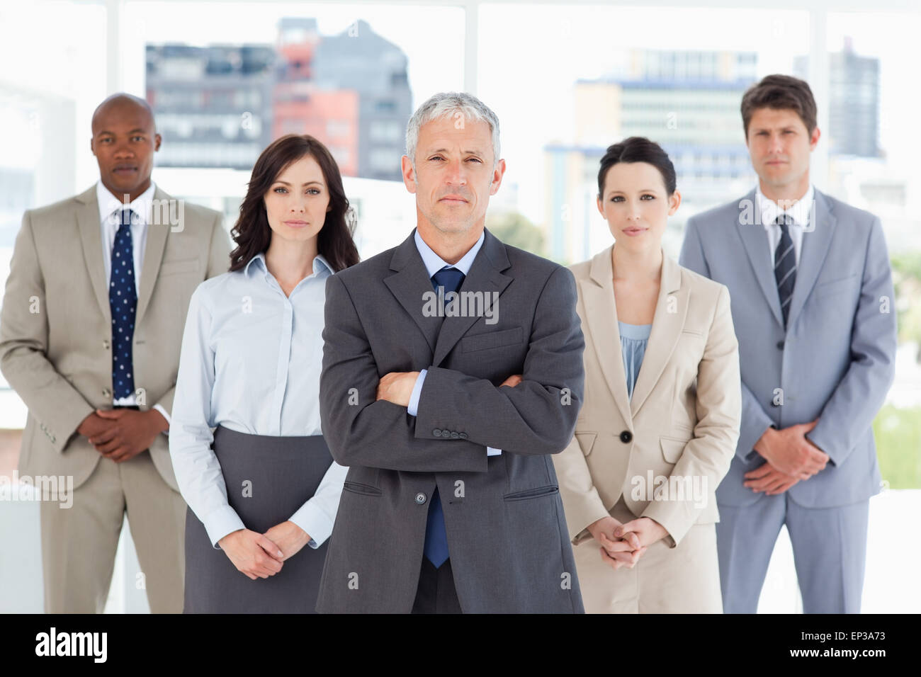 Mature serious manager crossing hi-res stock photography and images - Alamy