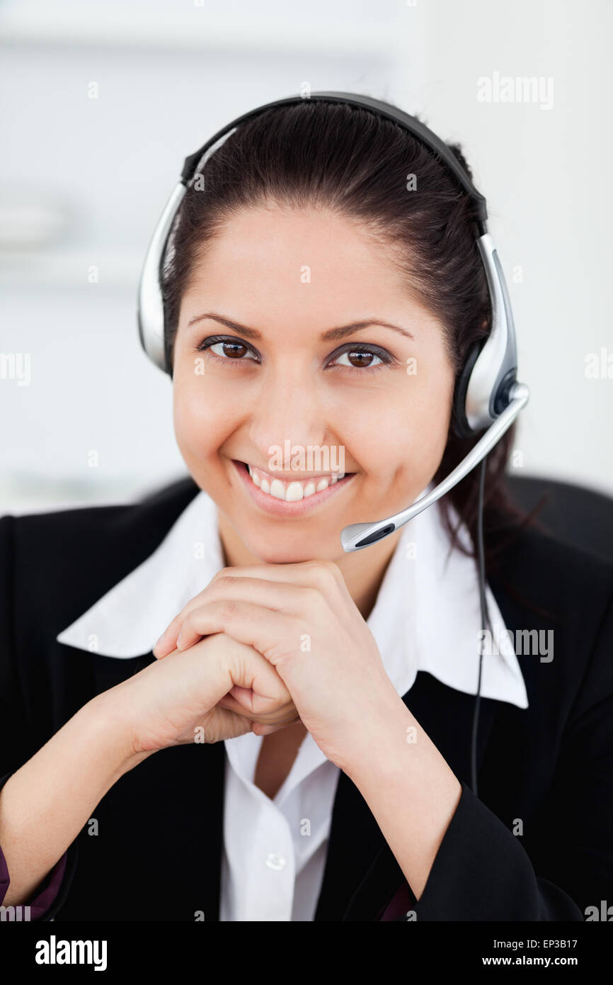 Smiling operator in office Stock Photo - Alamy