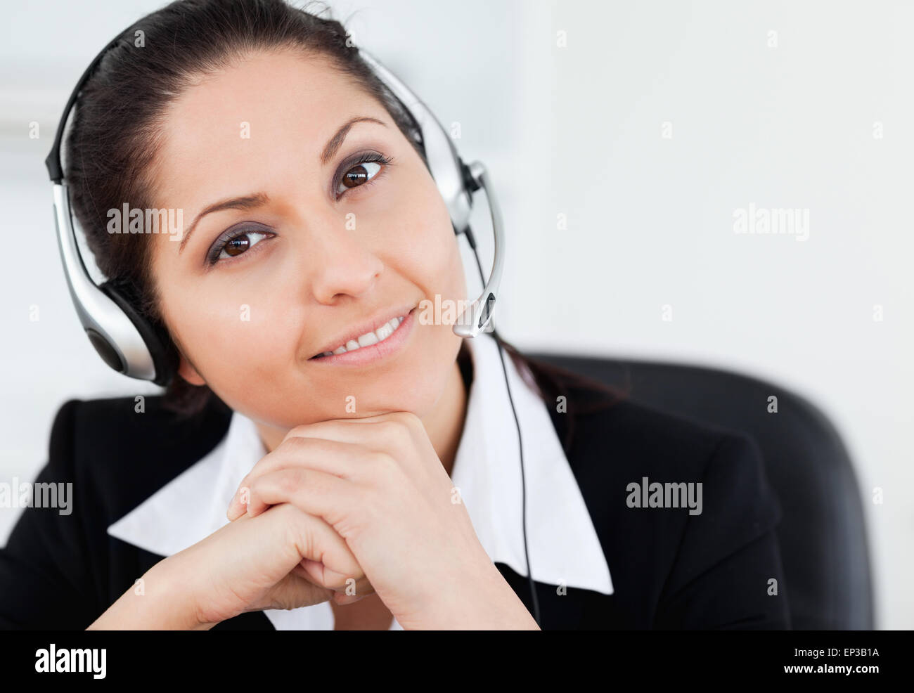 Happy operator with headset Stock Photo - Alamy