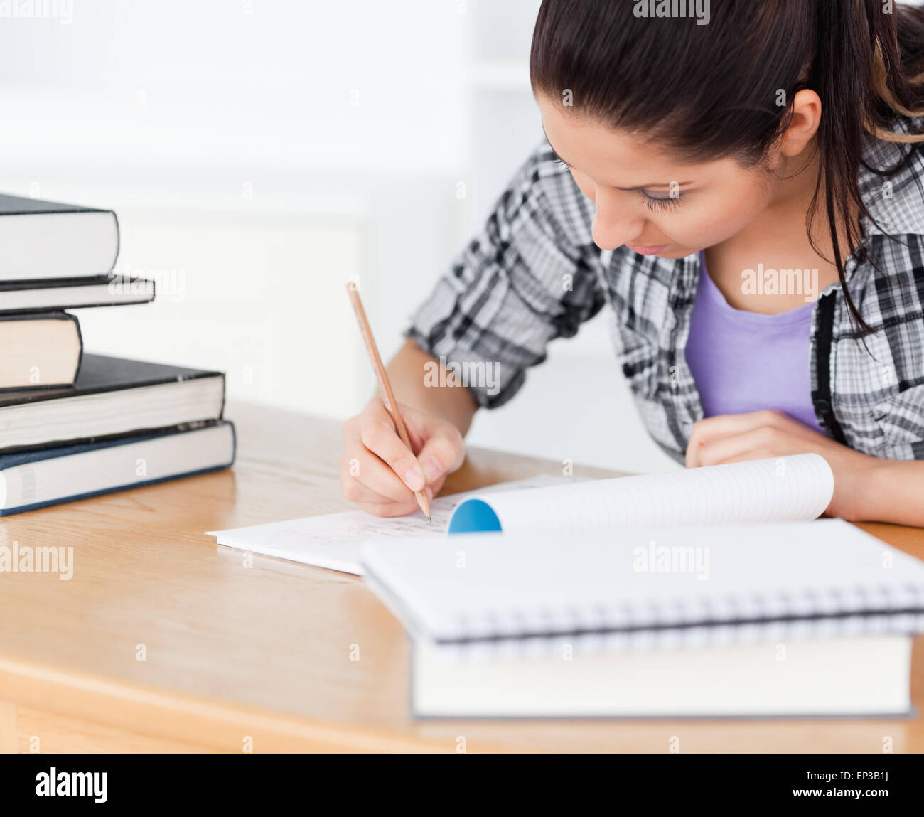 A young student learning Stock Photo - Alamy