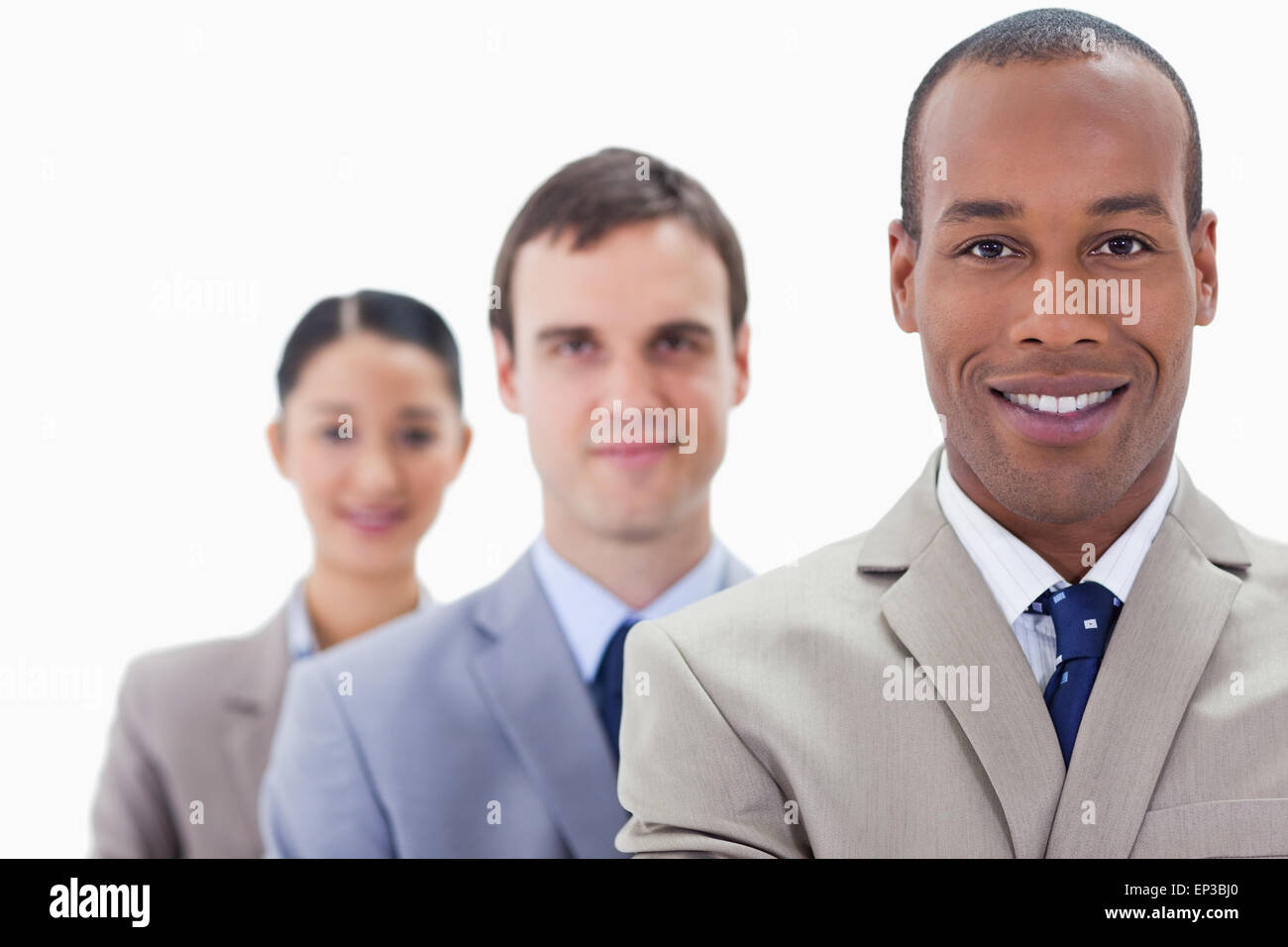 Big close-up of people dressed in suits smiling in a single line Stock ...