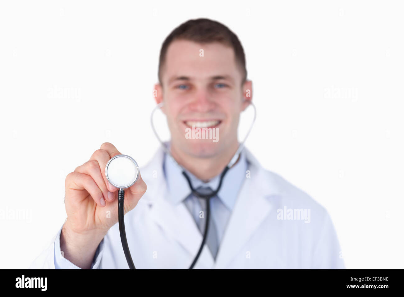 Close up of smiling doctor using his stethoscope Stock Photo - Alamy