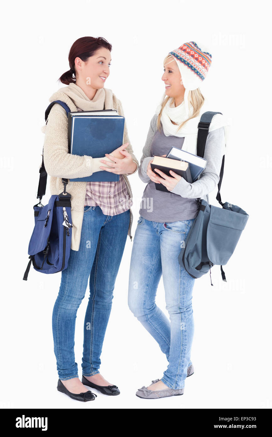 Two student talking Cut Out Stock Images & Pictures - Alamy