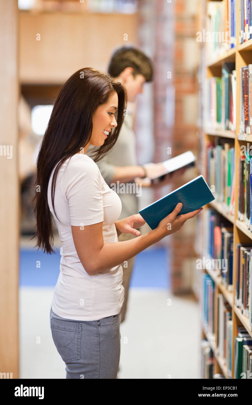 Portrait of students reading while standing up Stock Photo - Alamy