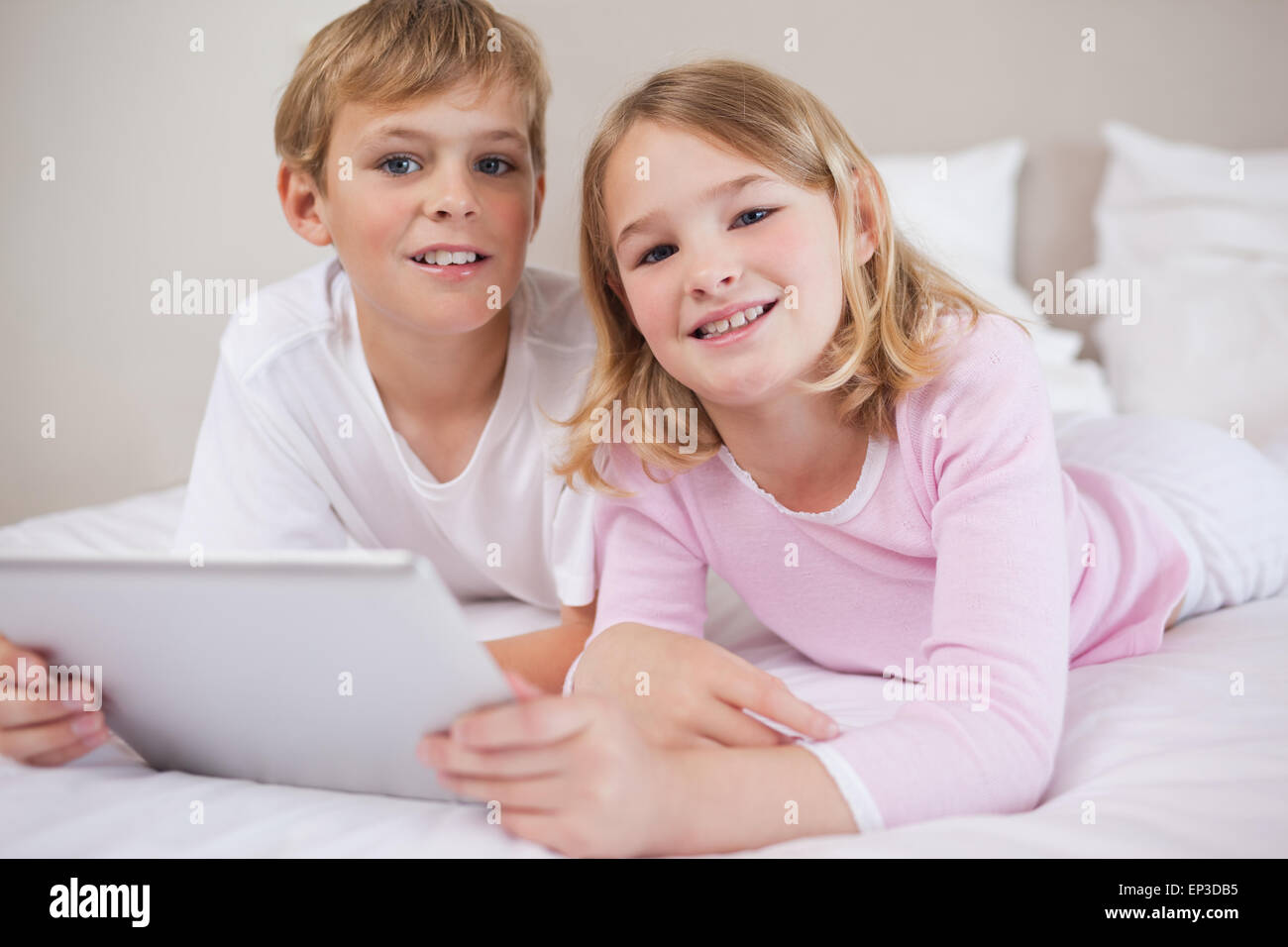 Children using a tablet computer Stock Photo - Alamy