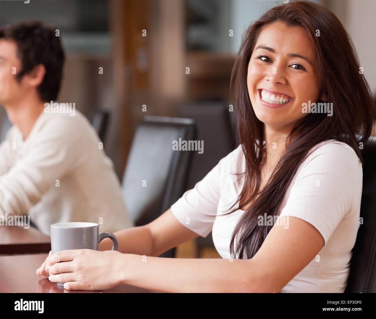 Happy woman having a coffee Stock Photo - Alamy