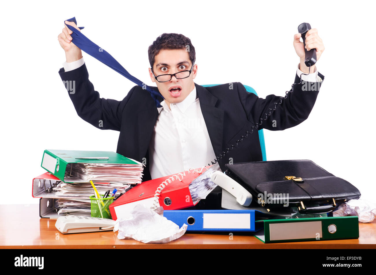 Young busy businessman at his desk Stock Photo - Alamy