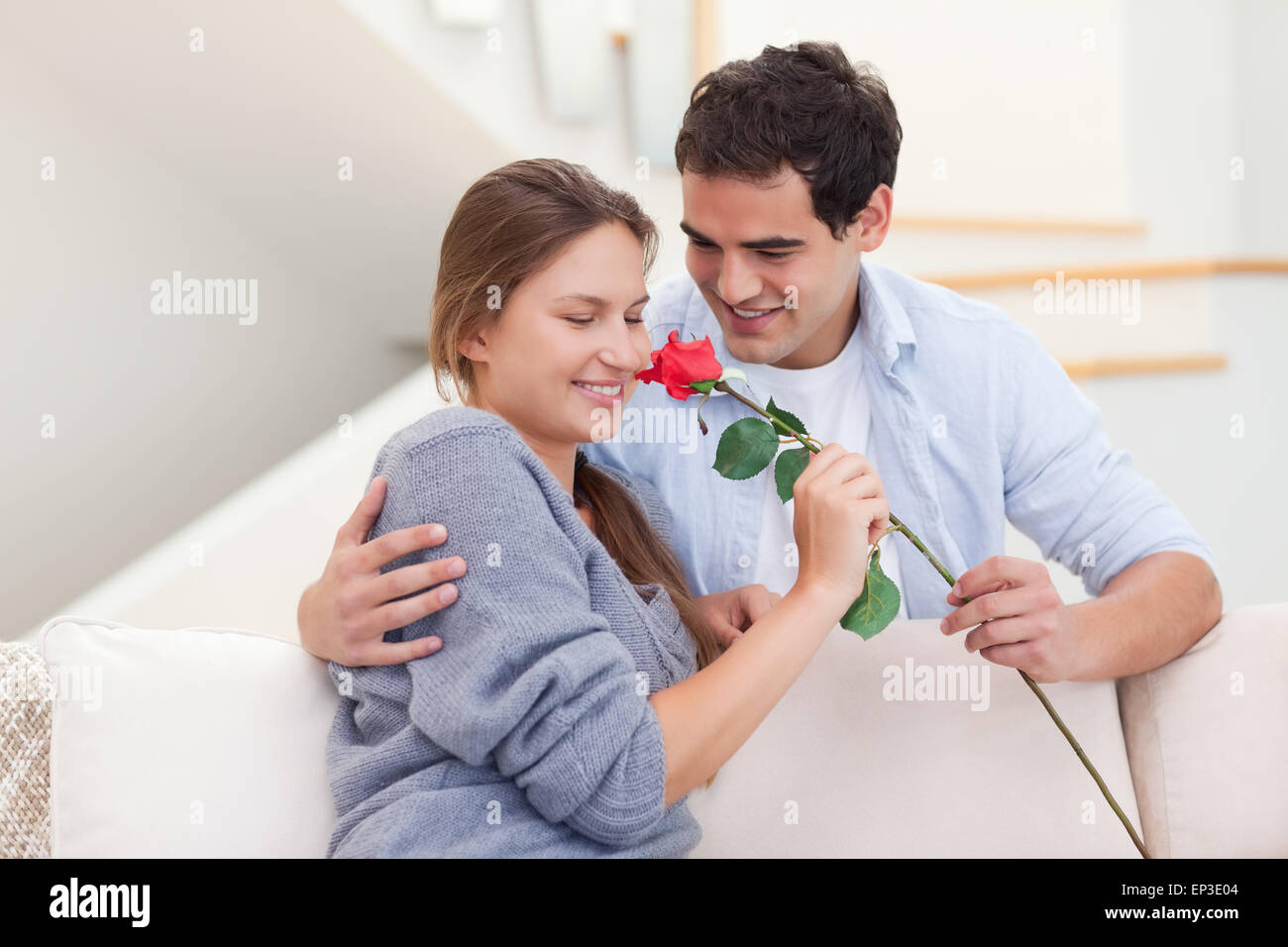 Handsome man giving rose wife hi-res stock photography and images - Alamy