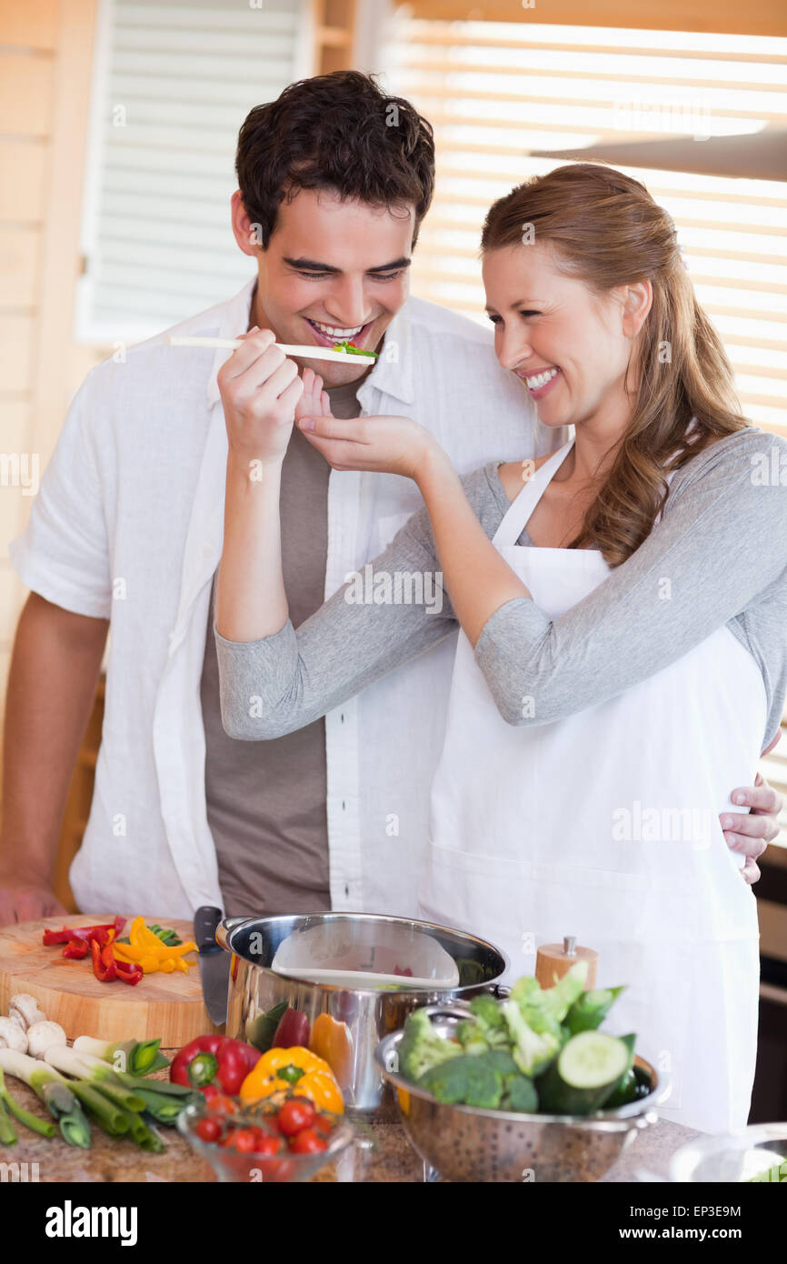 Couple having fun cooking together Stock Photo - Alamy