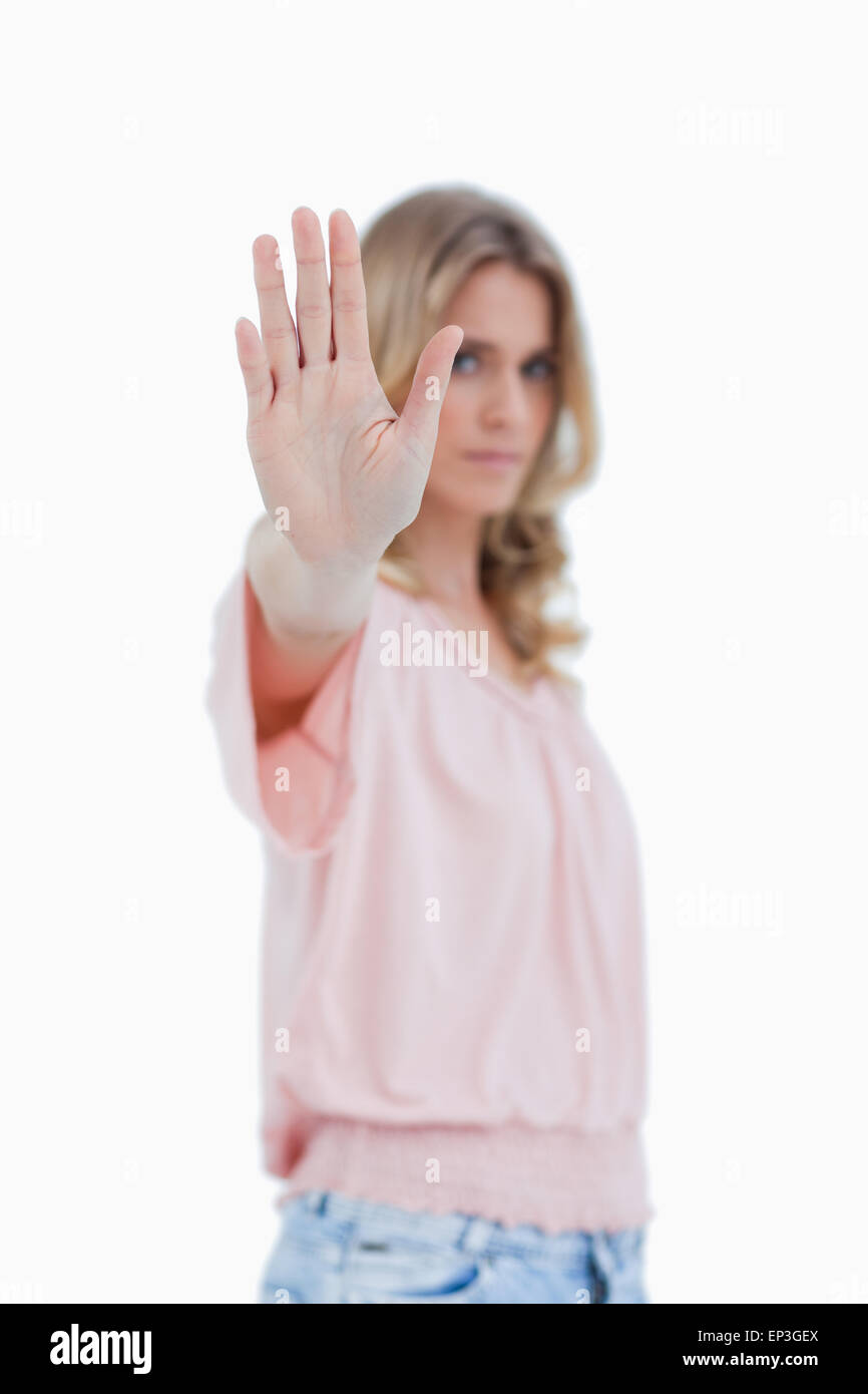 Focus shot of a woman with her hand held out to the camera Stock Photo ...