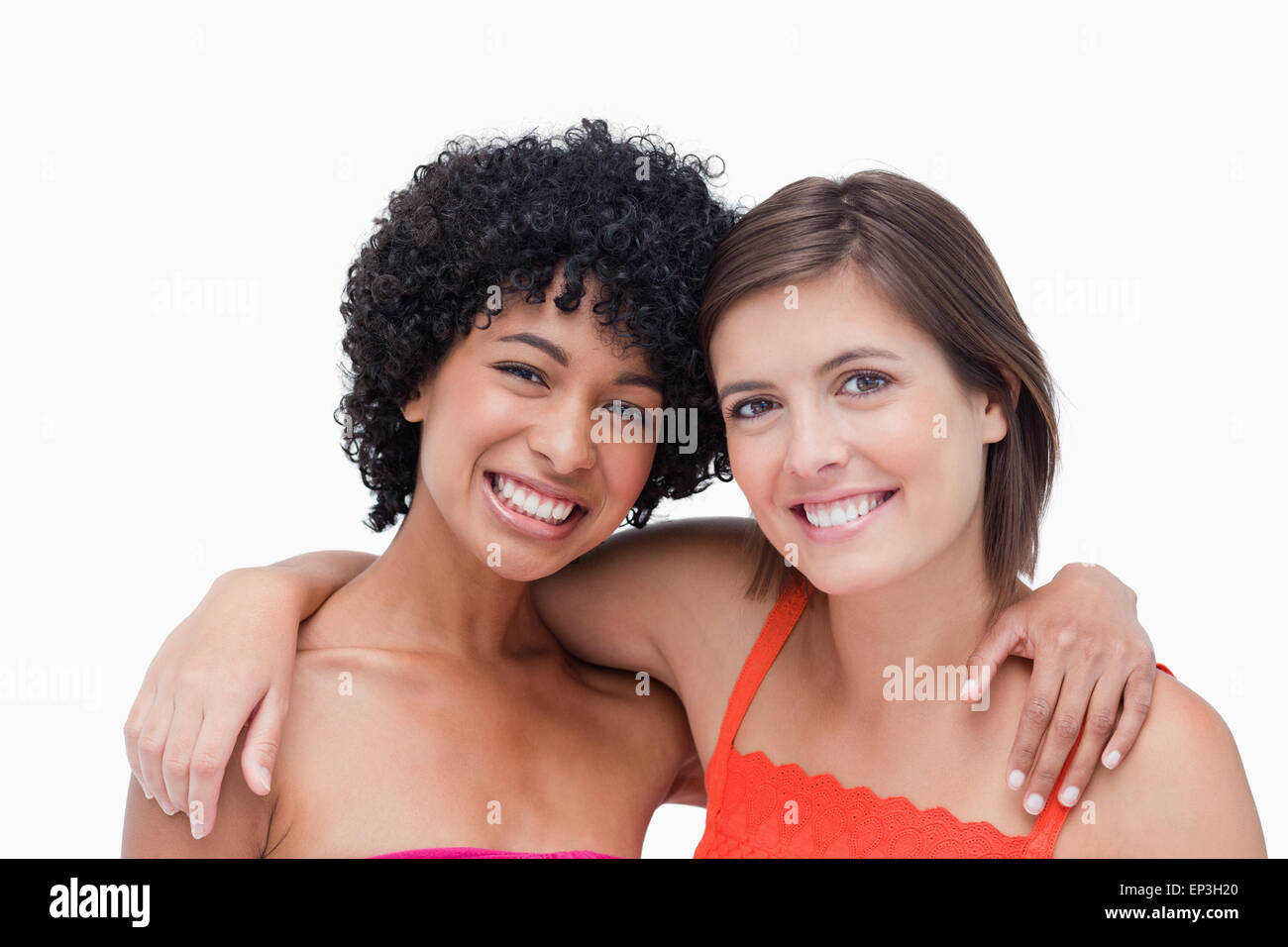 Two smiling friends holding each other by the shoulder Stock Photo - Alamy
