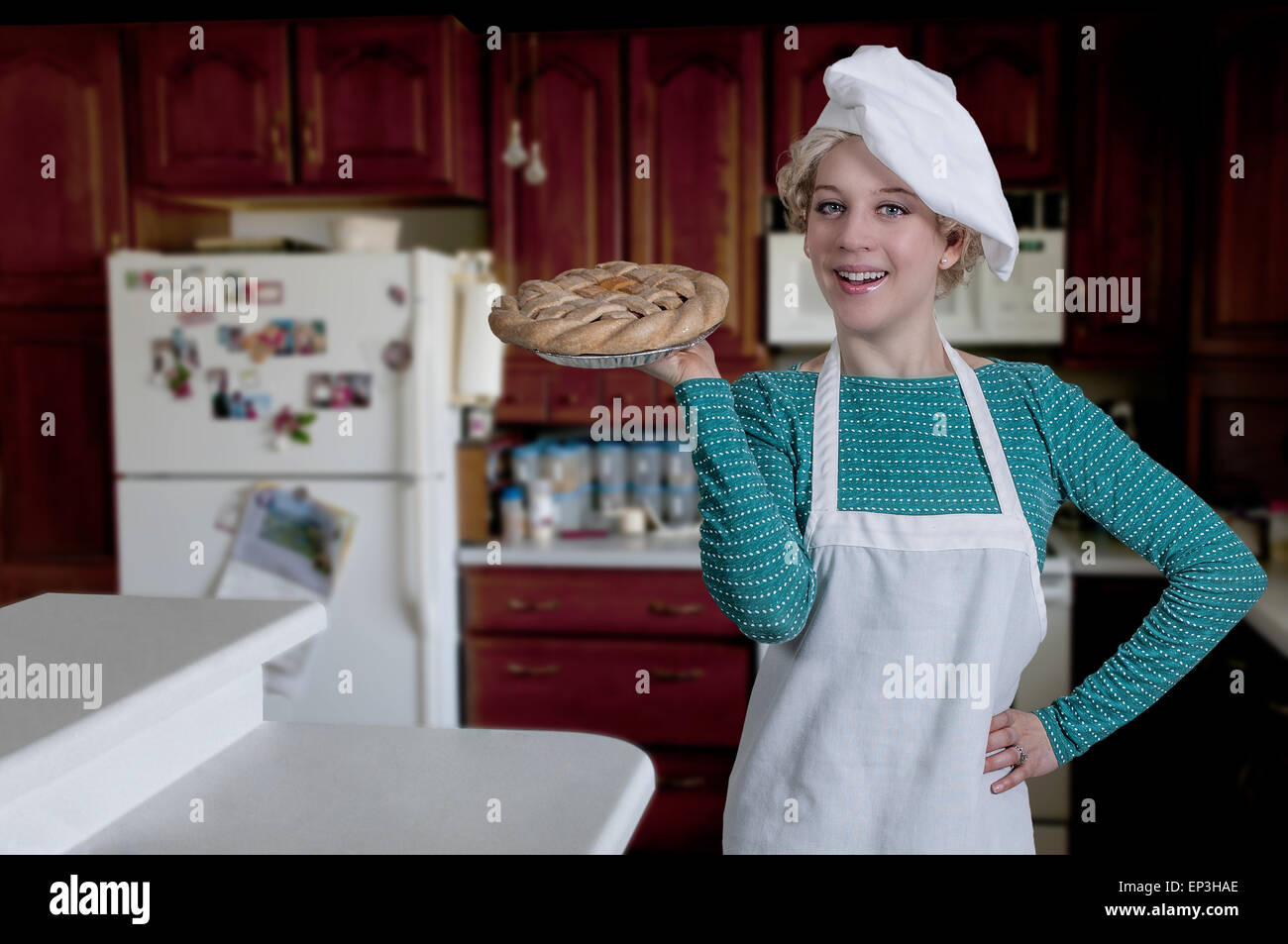 Woman Chef with Pie Stock Photo - Alamy