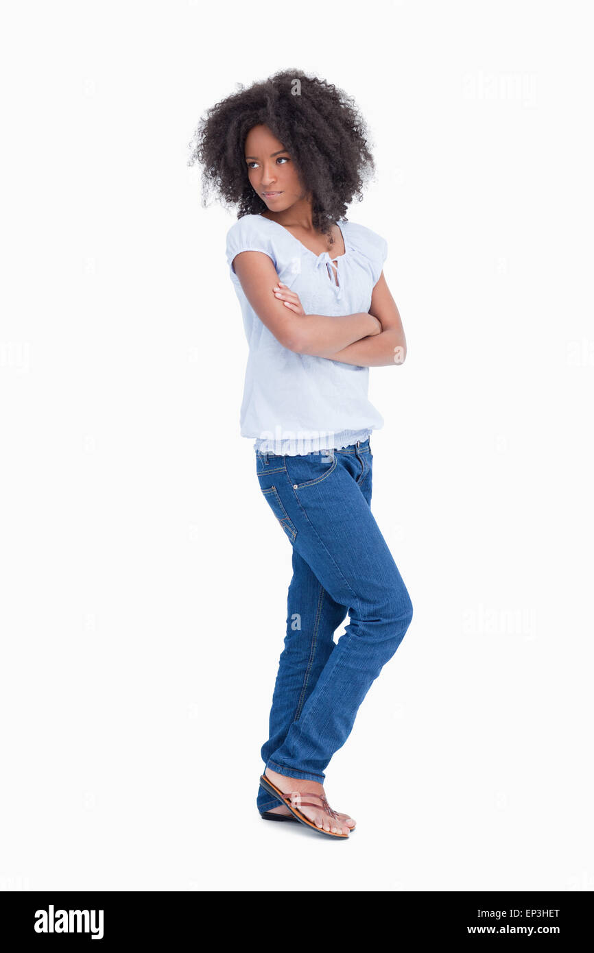 Side view of a serious young woman looking back Stock Photo - Alamy