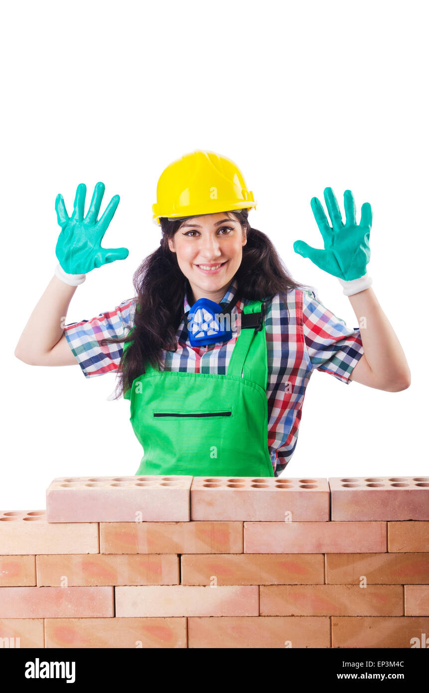 Woman builder with bricks on white Stock Photo - Alamy