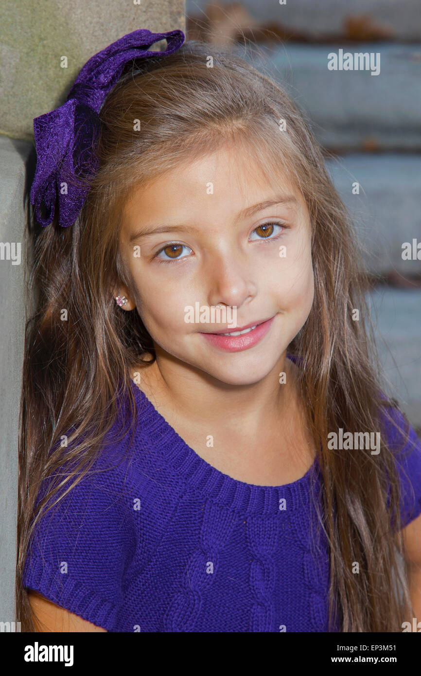 Pretty Girl Portrait in Purple Dress Stock Photo - Alamy