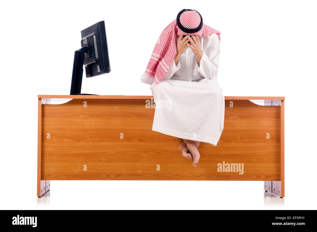 Arab man sitting at his desk Stock Photo - Alamy