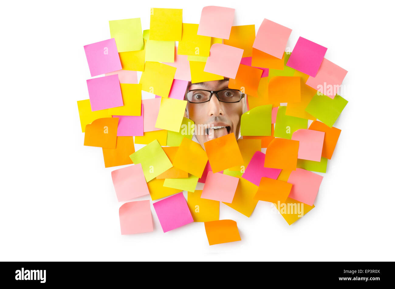 Man's face through paper and reminders Stock Photo - Alamy
