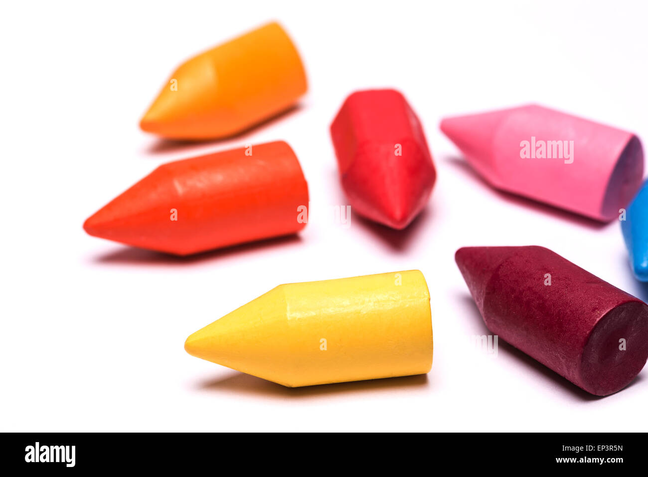 many colorful crayons scattered on a white background Stock Photo - Alamy