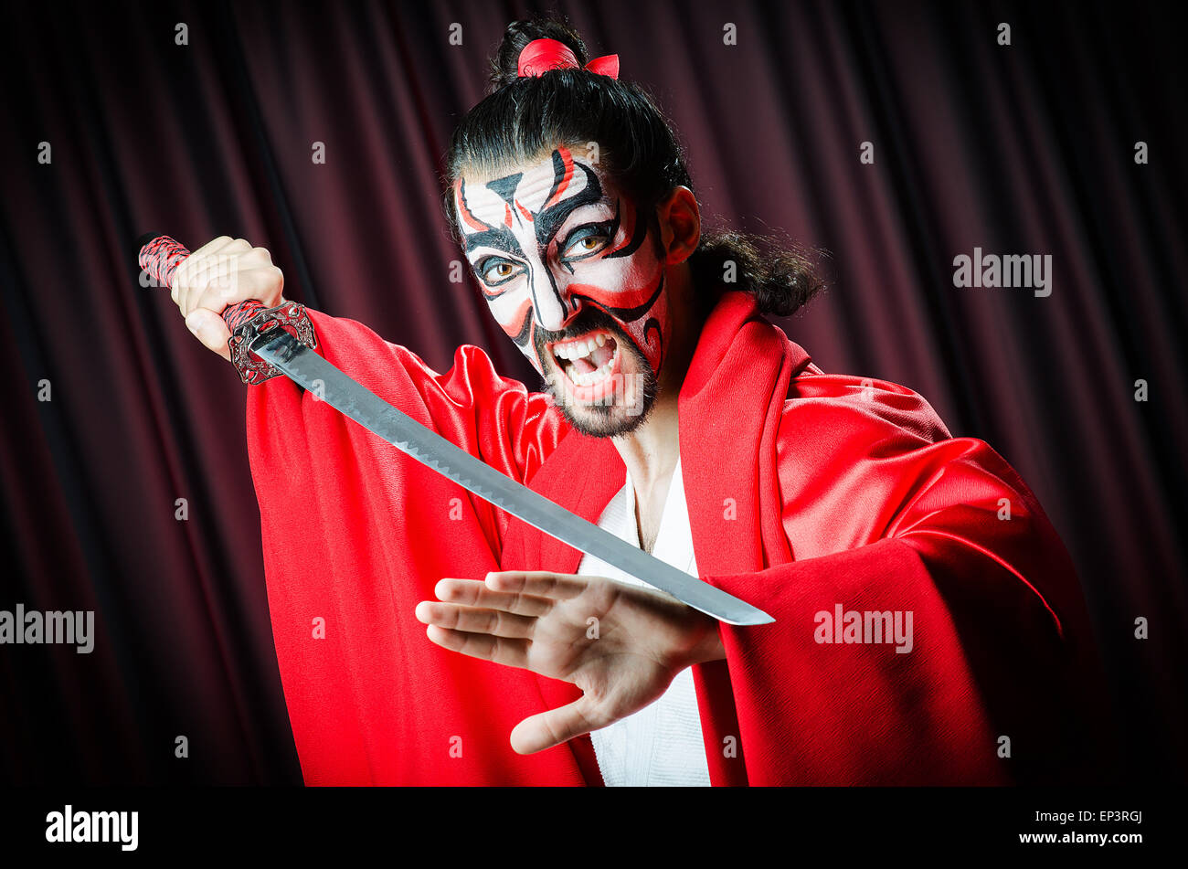 Man with sword and face mask Stock Photo - Alamy