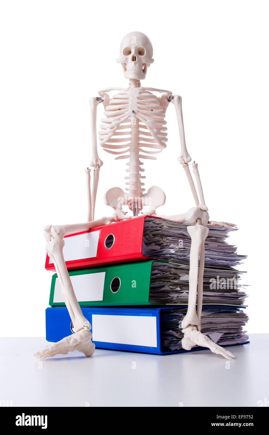 Skeleton with pile of files on white Stock Photo - Alamy